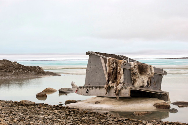 Photo: Parking lot: qamutik season winding down in Cambridge Bay