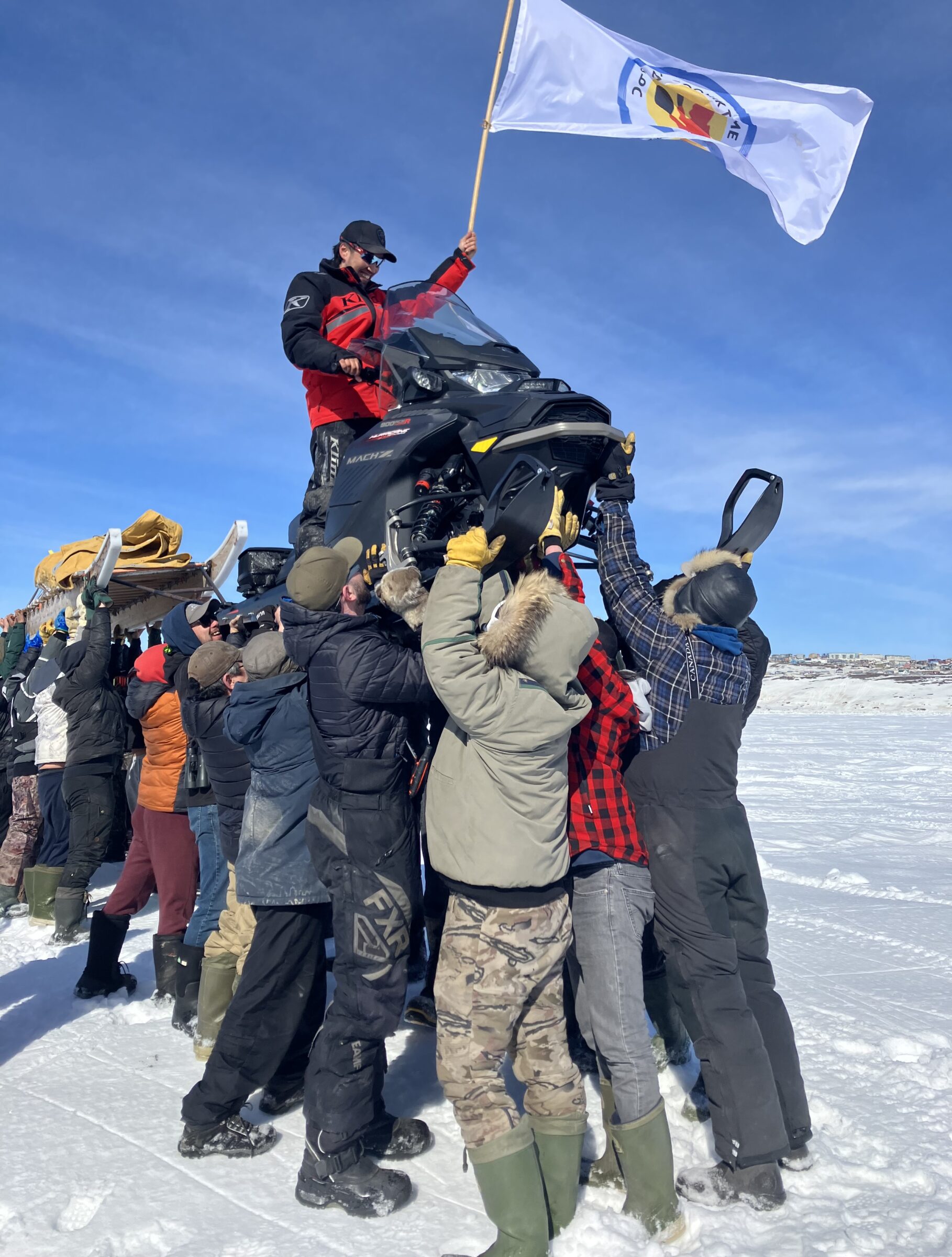 Two cousins and a buddy lead pack in Toonik Tyme snowmobile race